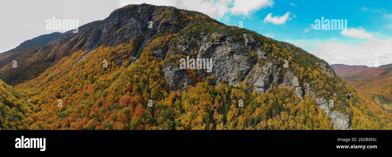 Panoramic view of peak fall foliage in Smugglers Notch, Vermont Stock ...