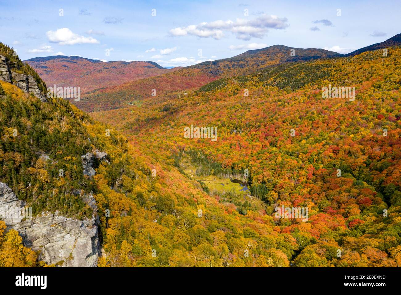 Panoramic view of peak fall foliage in Smugglers Notch, Vermont Stock ...