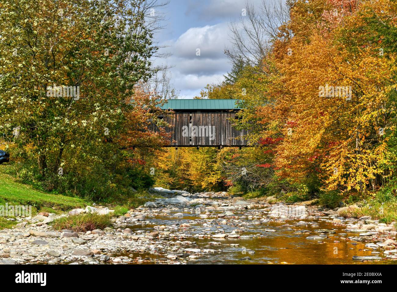 Grist Mill Covered Bridge in Cambridge, Vermont during fall foliage ...
