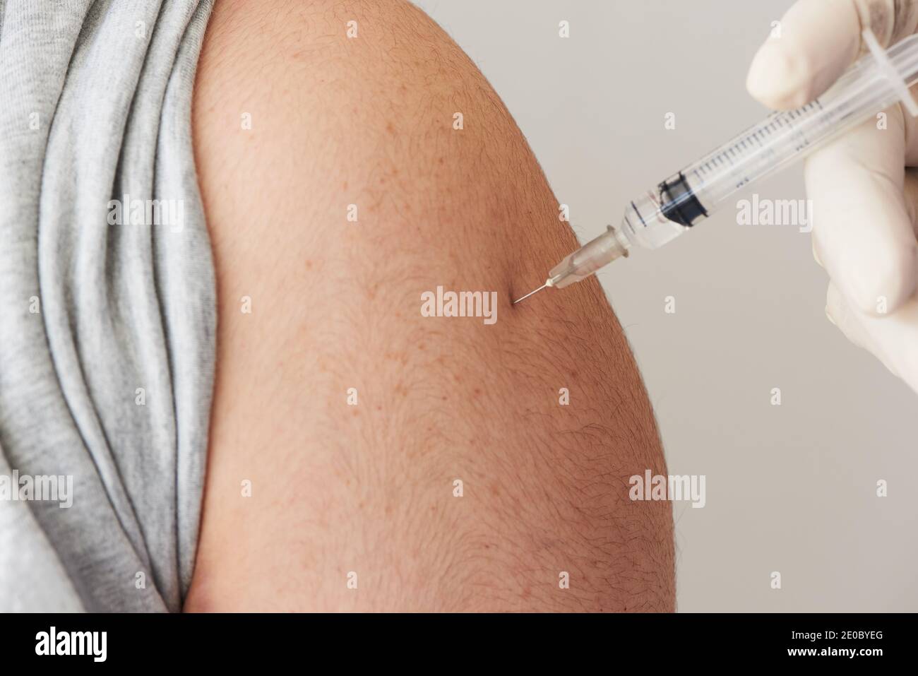 Adult patient vaccine pain hi-res stock photography and images - Alamy