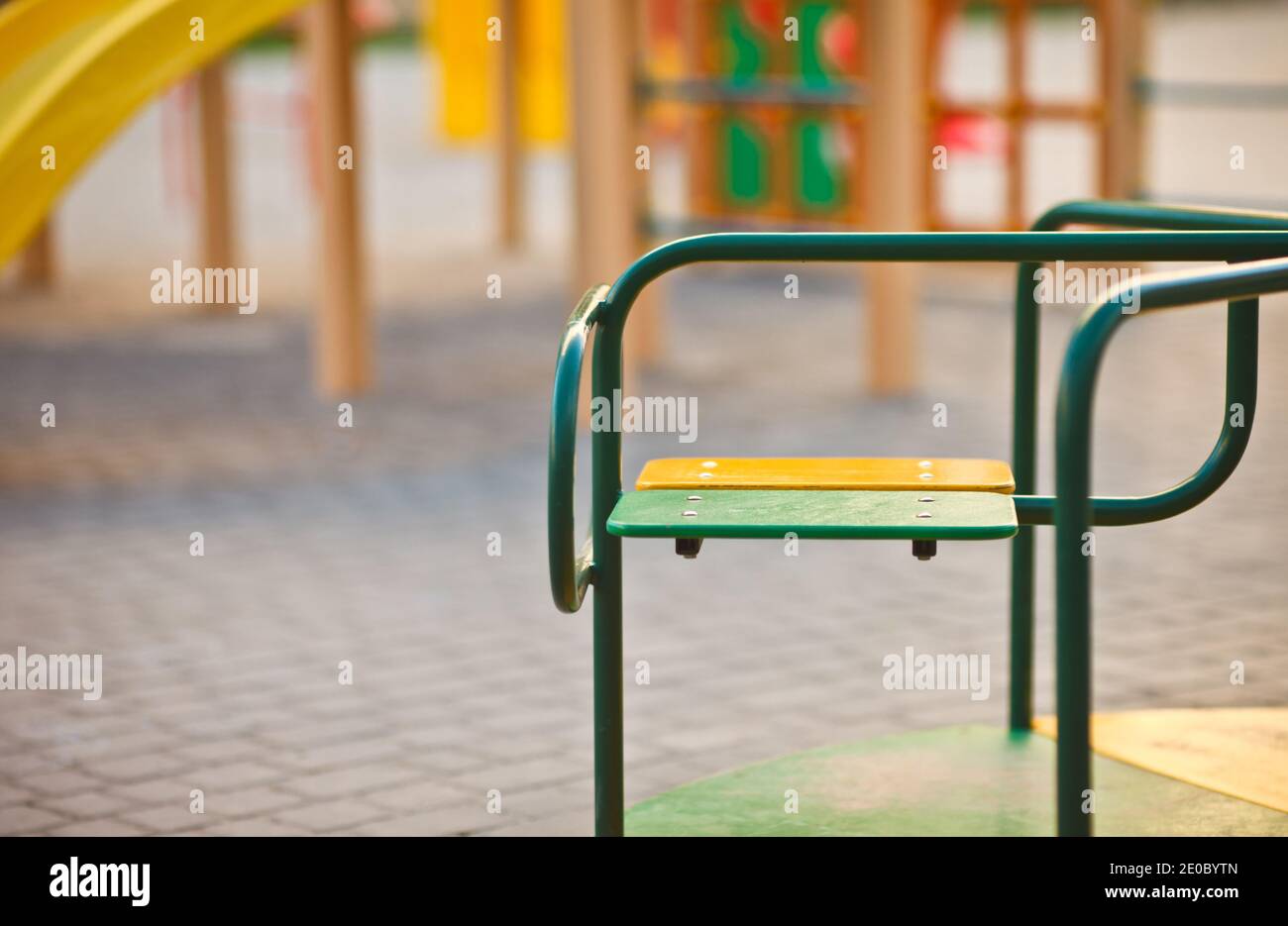 Children's round rotary swing in the playground outdoor close-up Stock ...