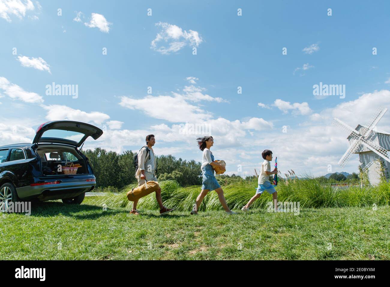 Happy happy family outing Stock Photo - Alamy