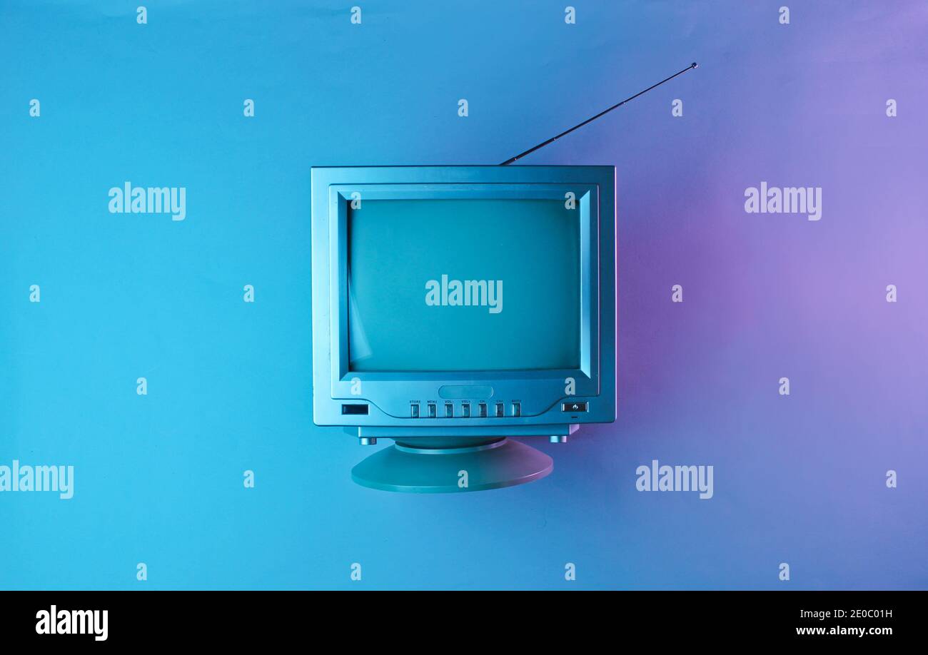 Retro wave, 80s. Old tv with antenna in holographic light. Top view ...