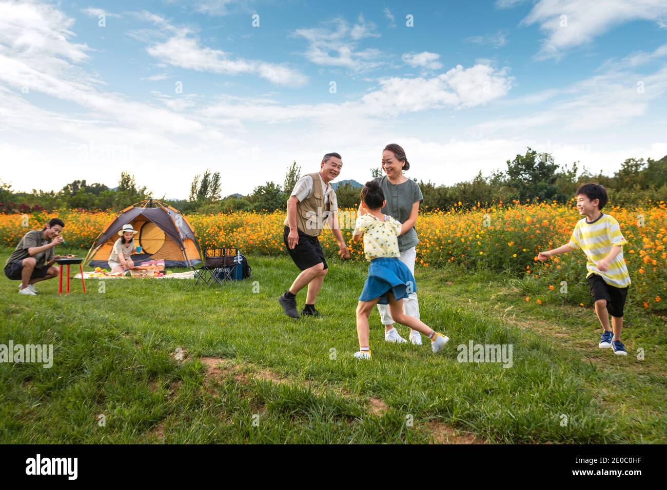 Happy family in the outdoor outing Stock Photo - Alamy