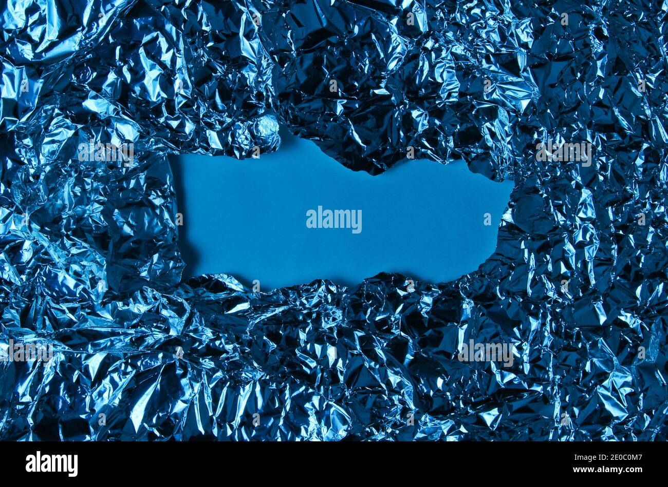 Torn Frame of crumpled foil with space for your infirmation. Copy space ...