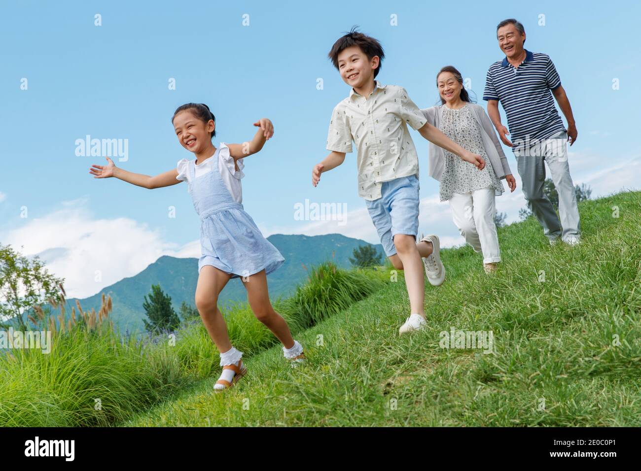 Happy old man and the children in the outside for a walk Stock Photo ...