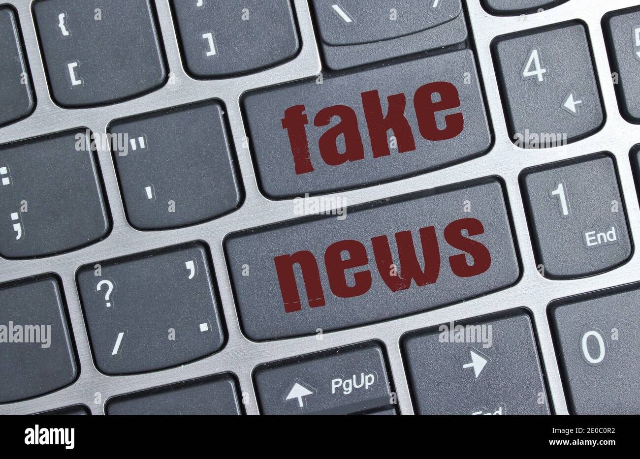 Inscription fake news on the keyboard keys Stock Photo - Alamy