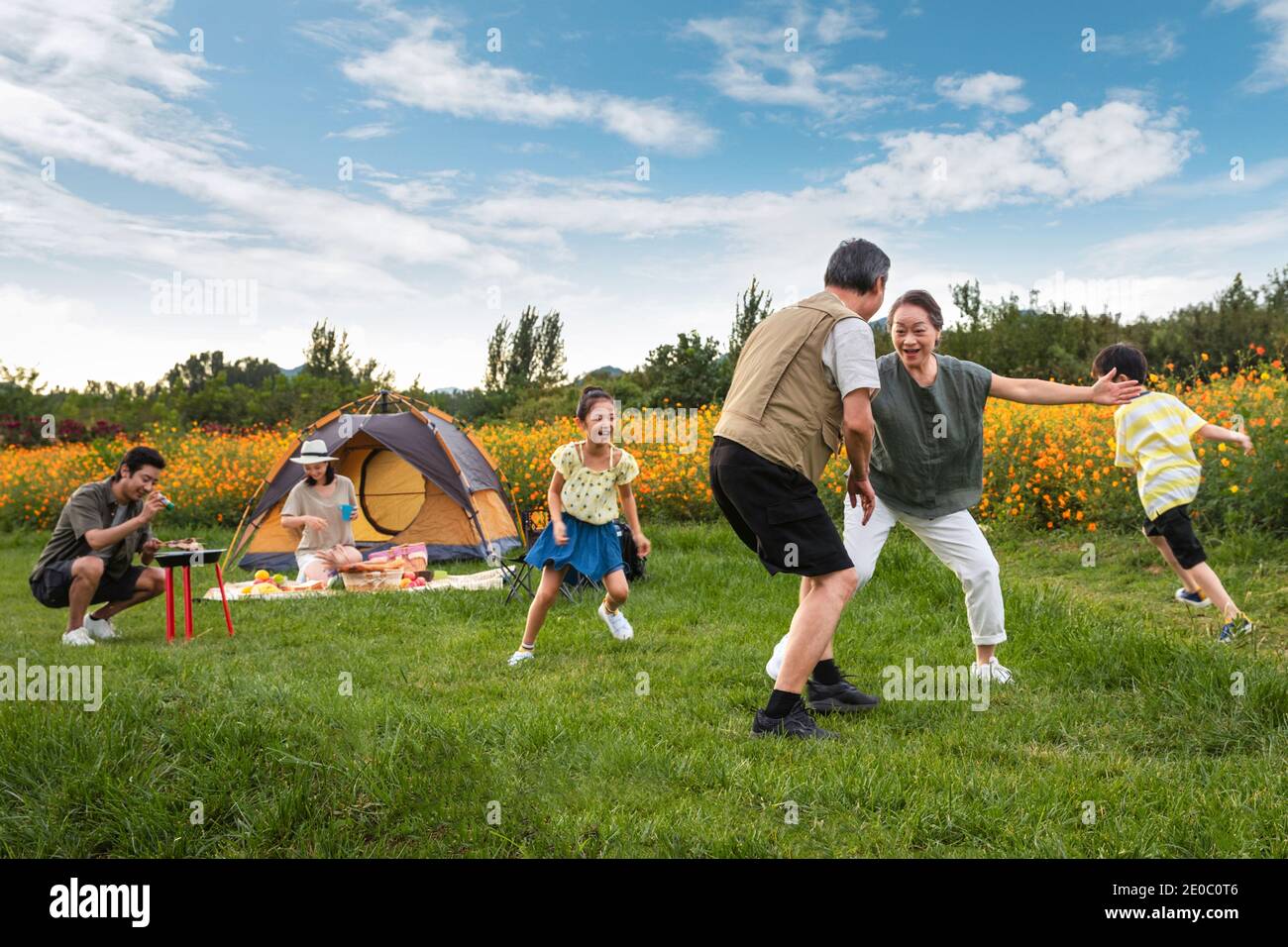 Happy family in the outdoor outing Stock Photo - Alamy