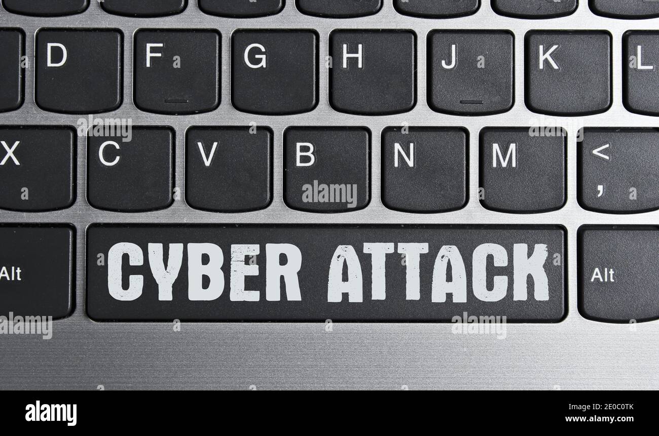 Inscription cyber attack on the keyboard key Stock Photo - Alamy