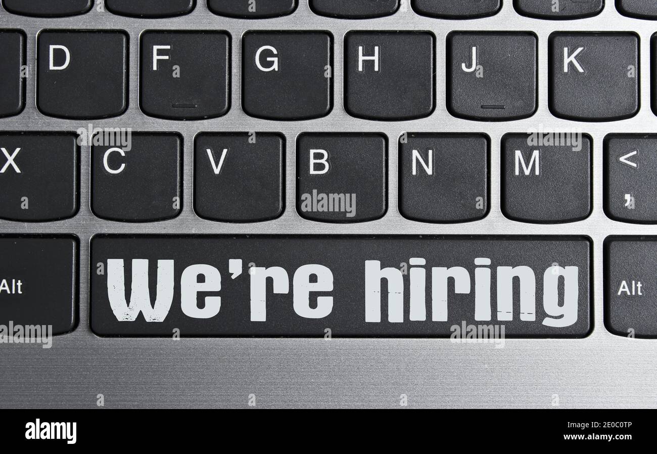 Text We're hiring on the keyboard key Stock Photo - Alamy