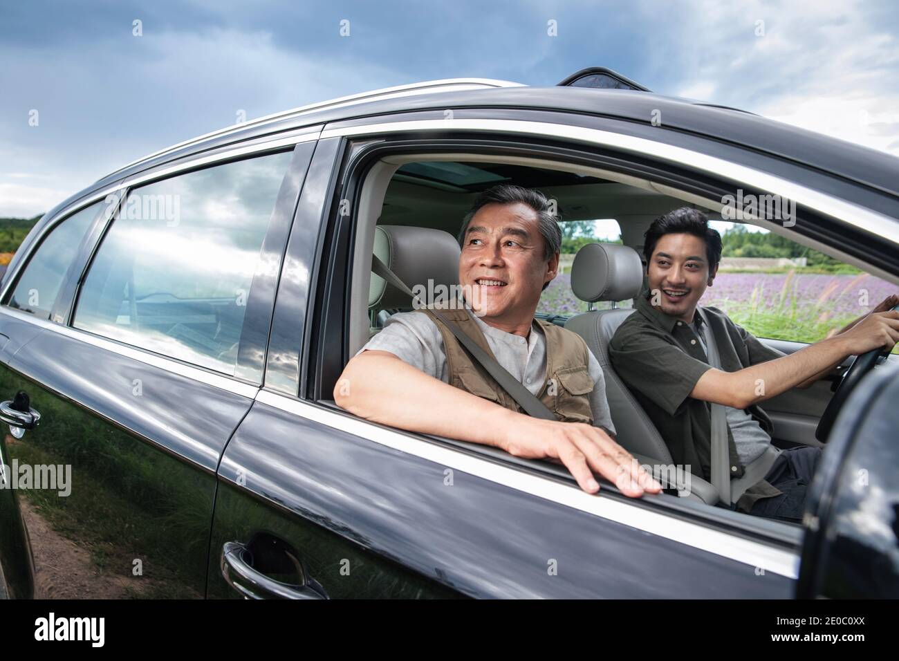 Father and son travel driving a car Stock Photo - Alamy