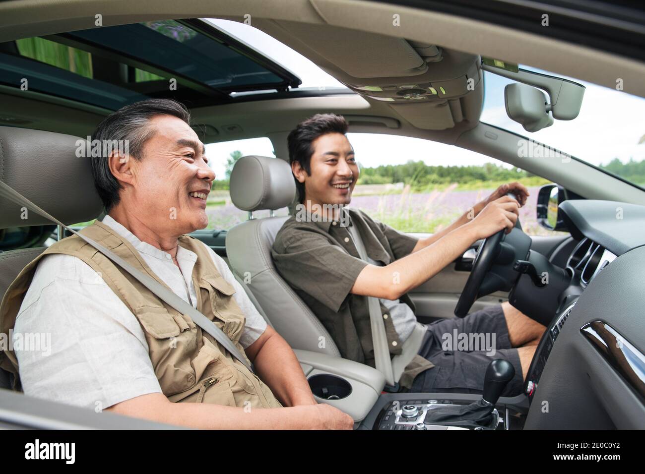 Father and son driving a car hi-res stock photography and images - Alamy