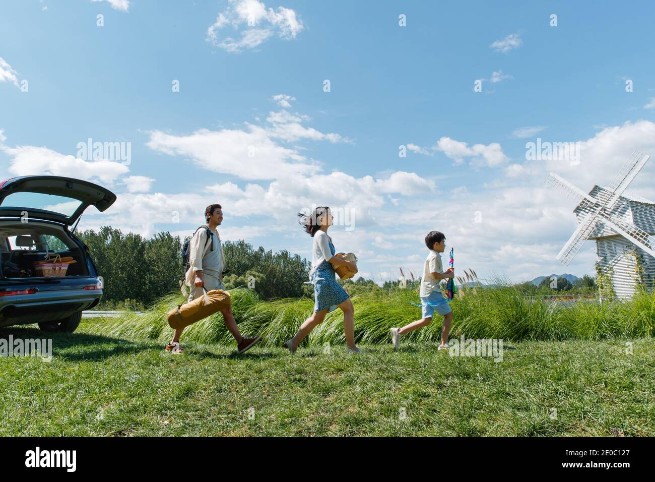 Happy young asian indian couple camping High Resolution Stock ...