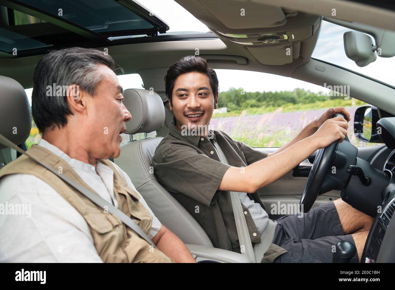 Father and son driving a car hi-res stock photography and images - Alamy