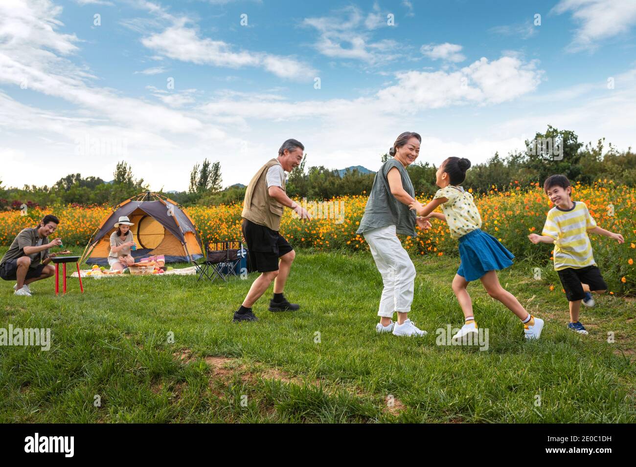 Happy family in the outdoor outing Stock Photo - Alamy