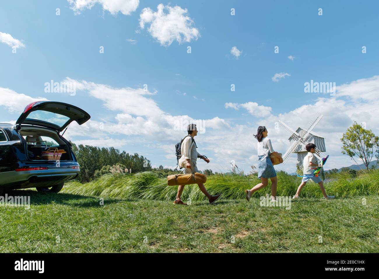 Happy happy family outing Stock Photo - Alamy