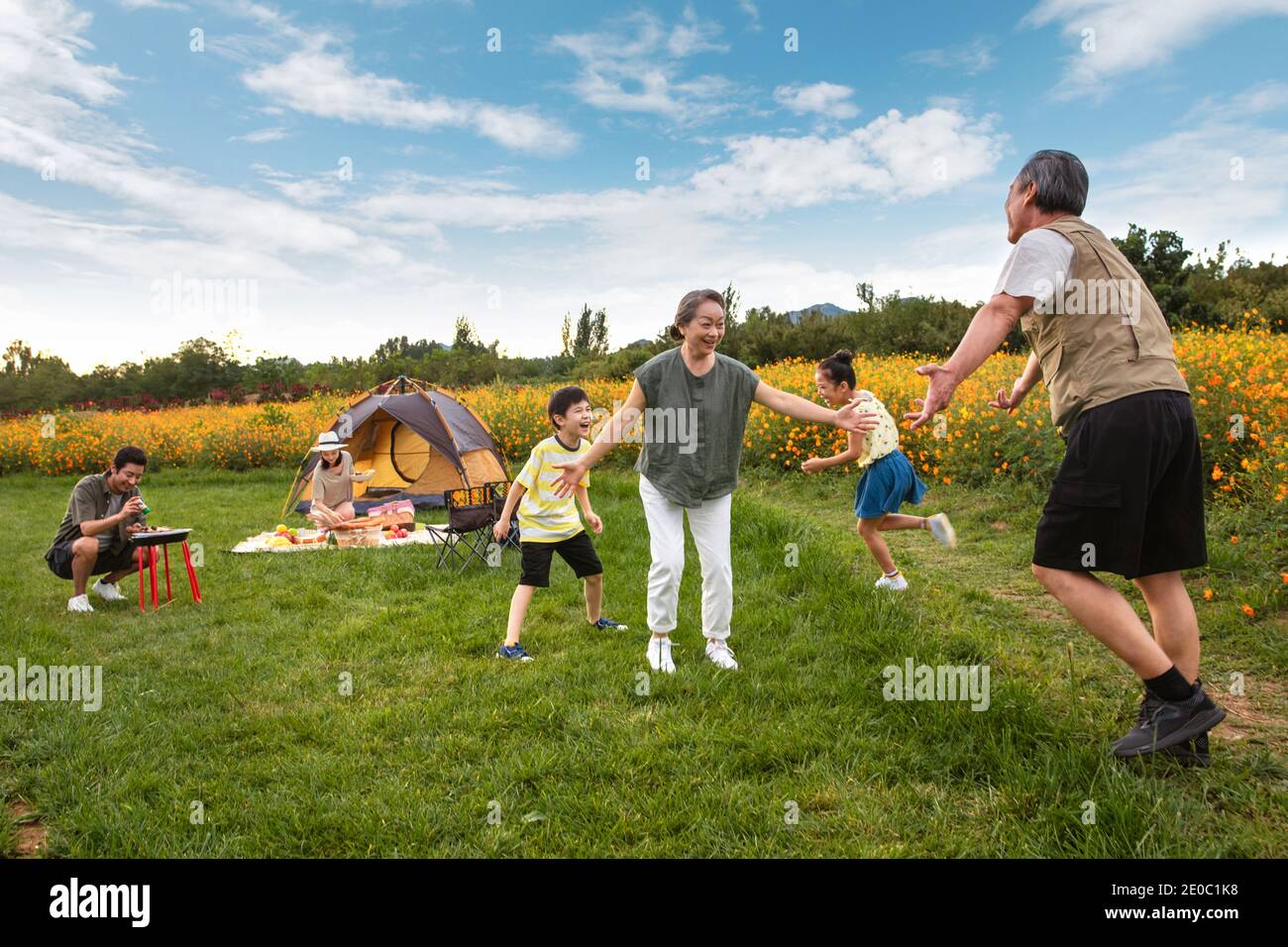 Happy family in the outdoor outing Stock Photo - Alamy