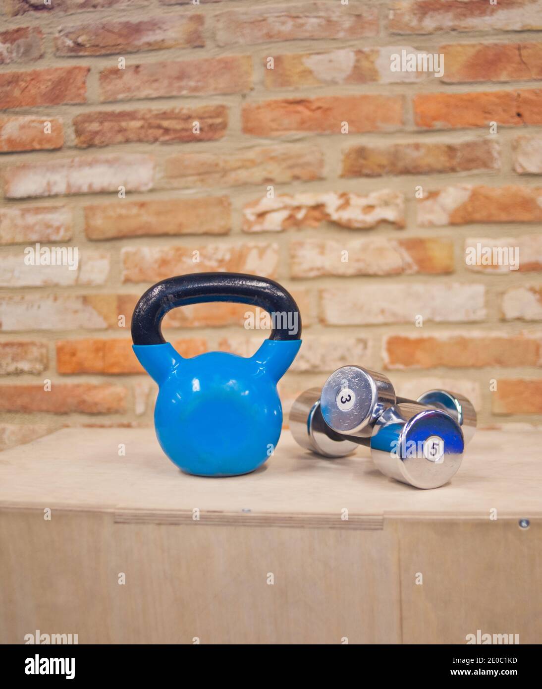 Functional training concept. Kettlebell, dumbbell stand on wooden box ...