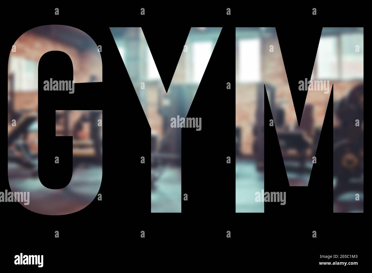 Blurred photo gym equipment in the form of the word gym Stock Photo - Alamy