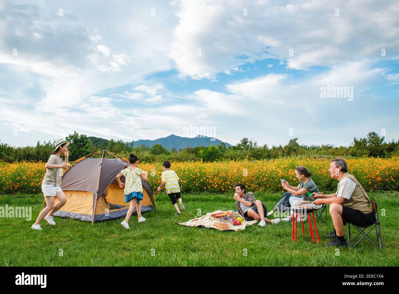Happy family in the outdoor outing Stock Photo - Alamy
