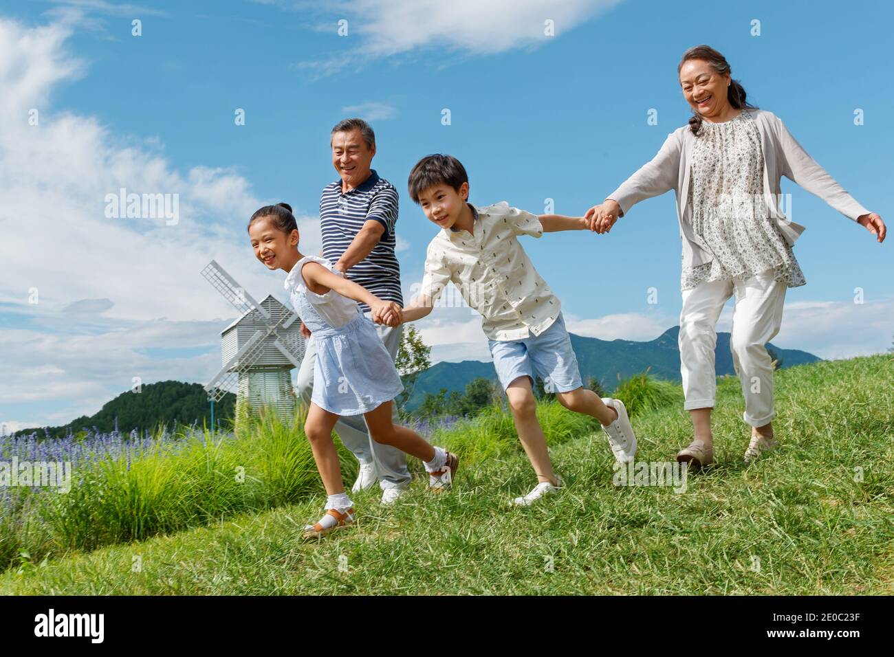Happy old man and the children in the outside for a walk Stock Photo ...