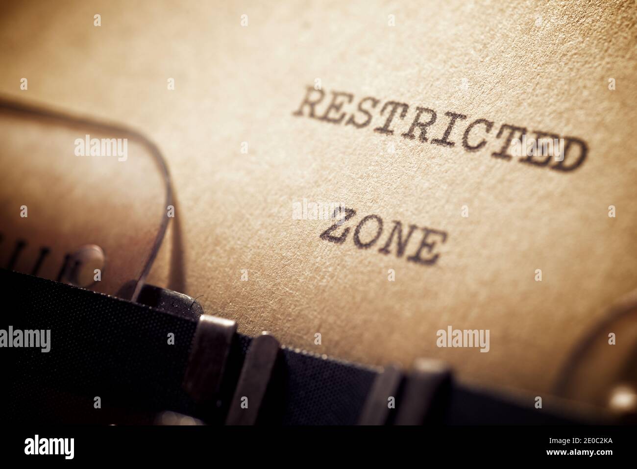 Restricted zone phrase written with a typewriter Stock Photo - Alamy