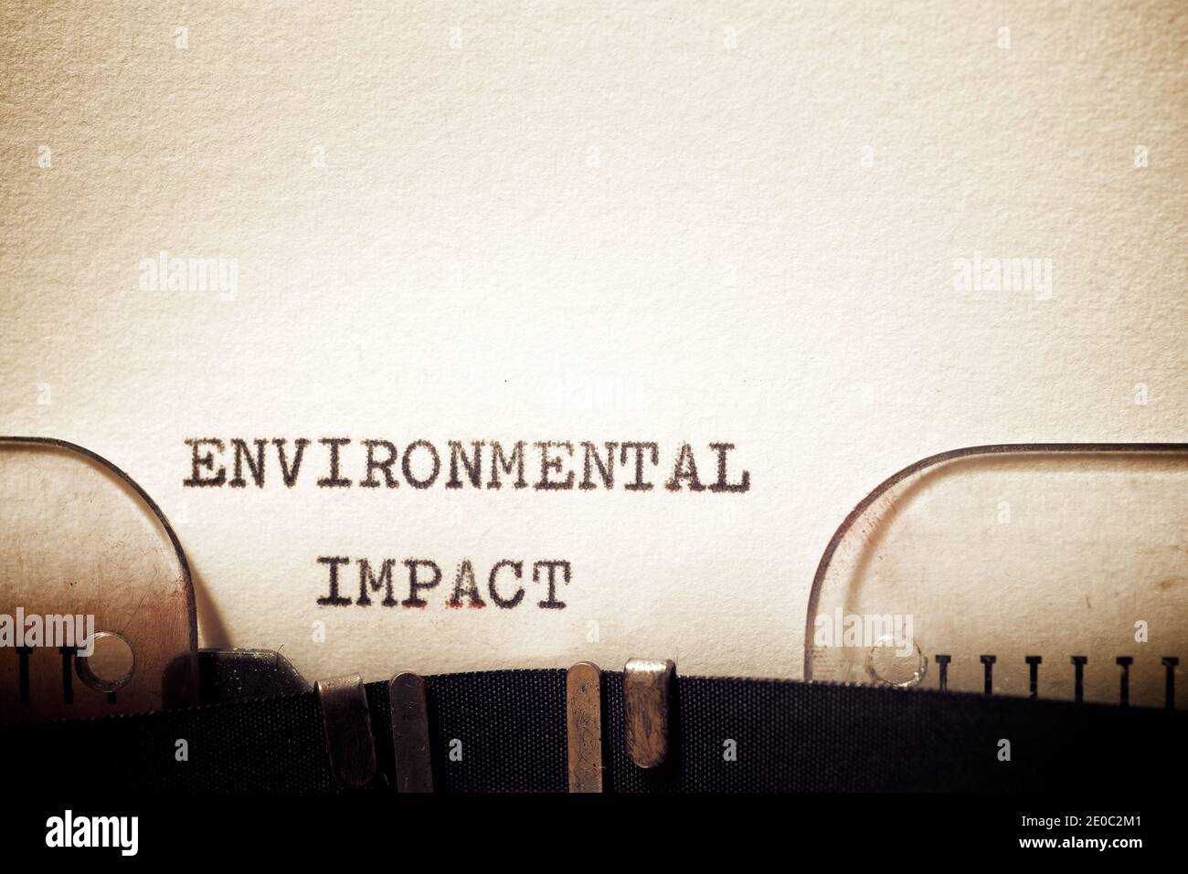 Environmental impact phrase written with a typewriter Stock Photo - Alamy
