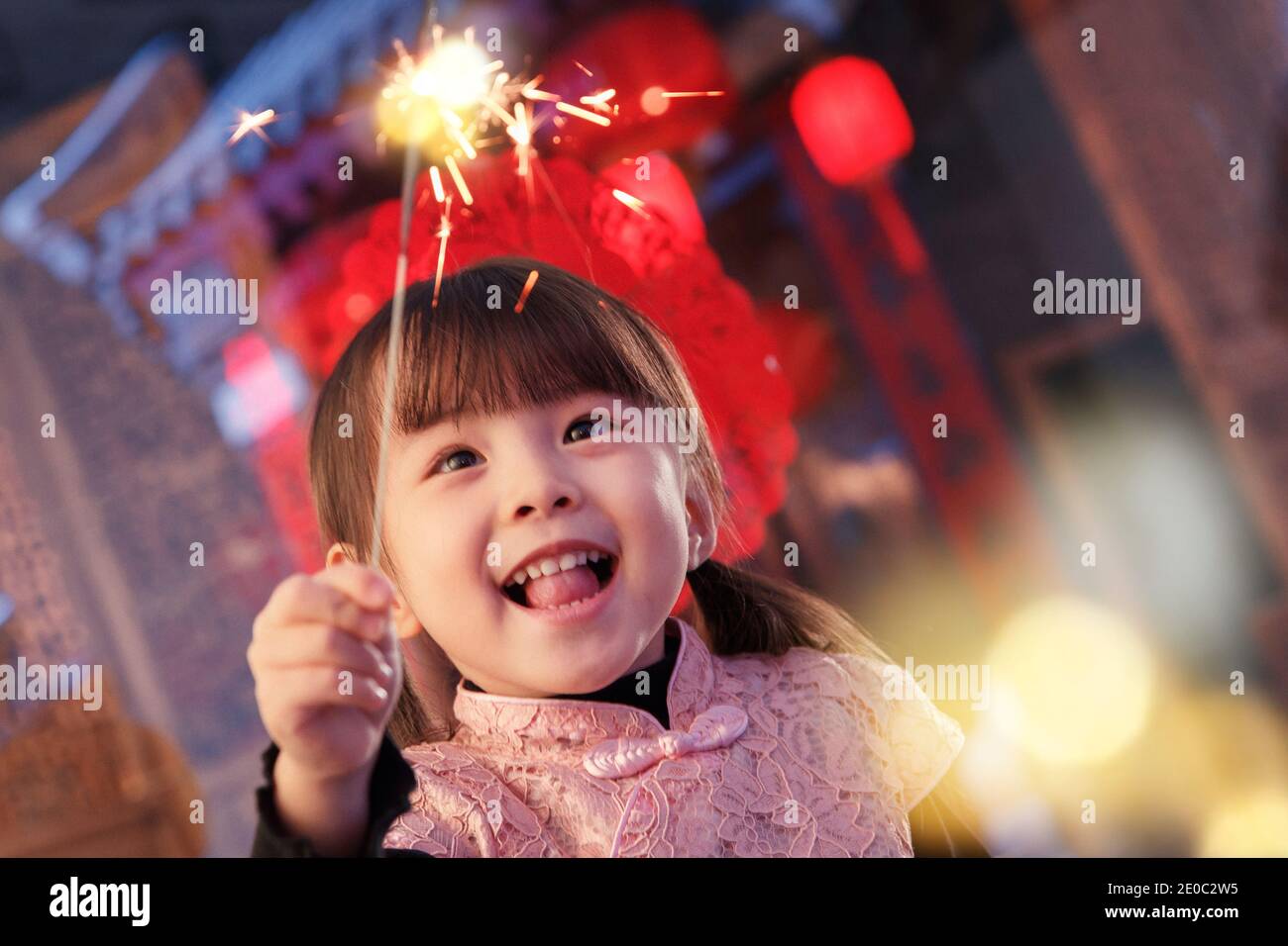The lovely little girl with fireworks Stock Photo - Alamy