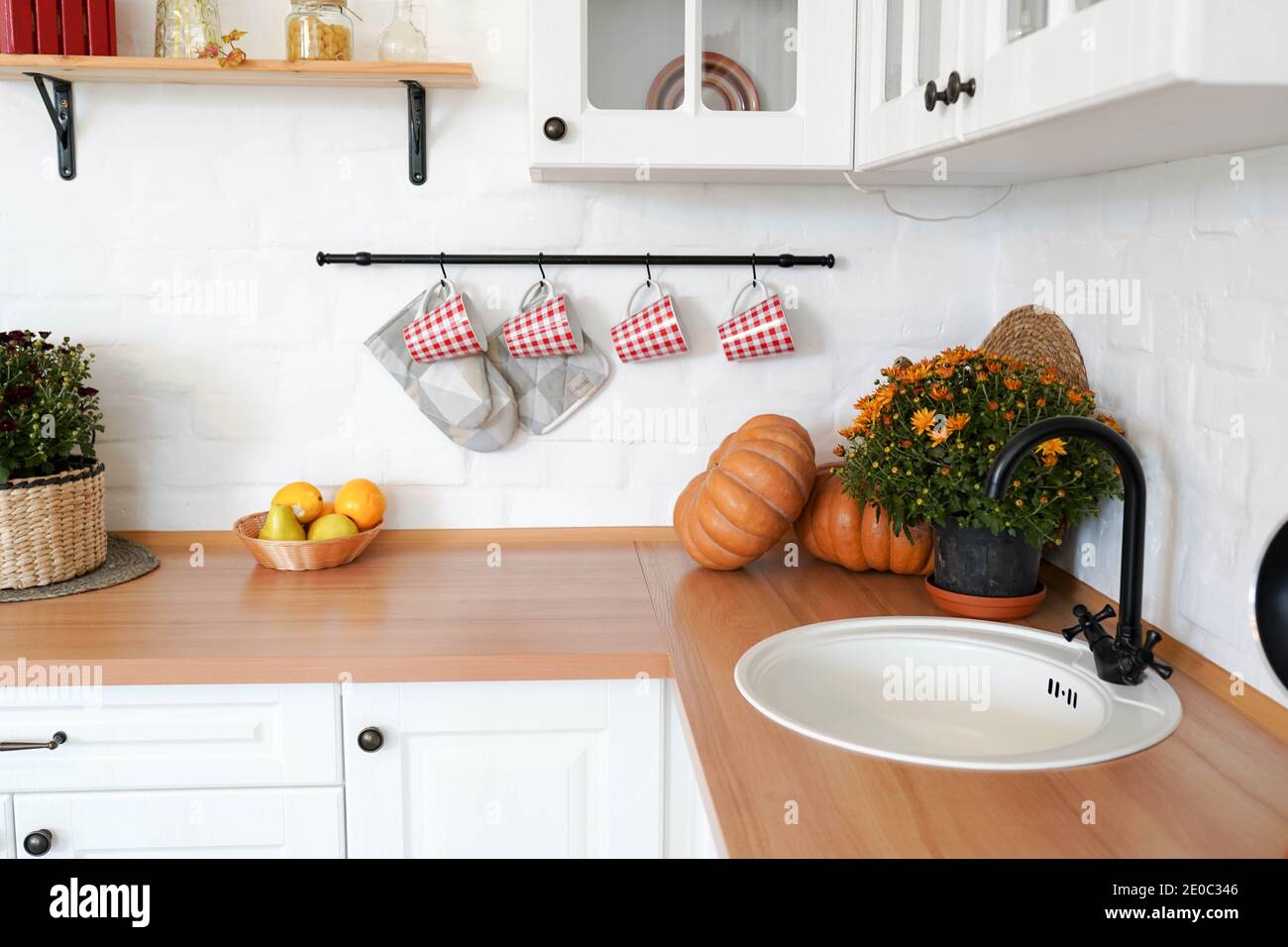 Kitchen interior autumn wooden table, horizontally Stock Photo - Alamy