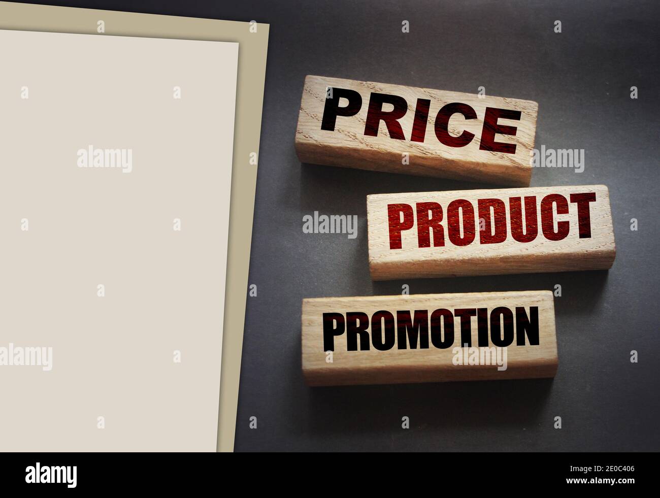Price product promotion words on a wooden blocks on a black background ...