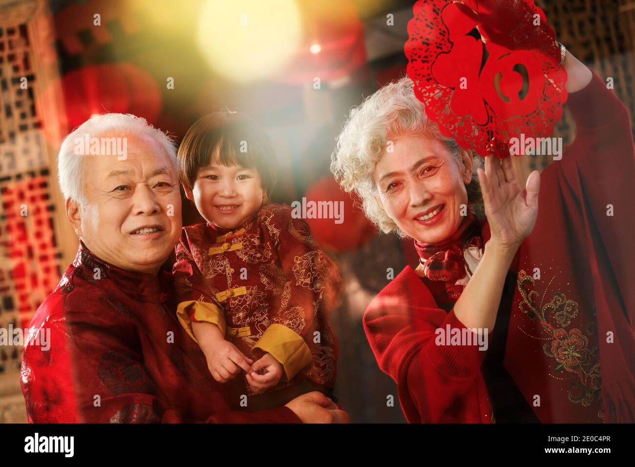 Two generations together paste paper-cut Stock Photo - Alamy