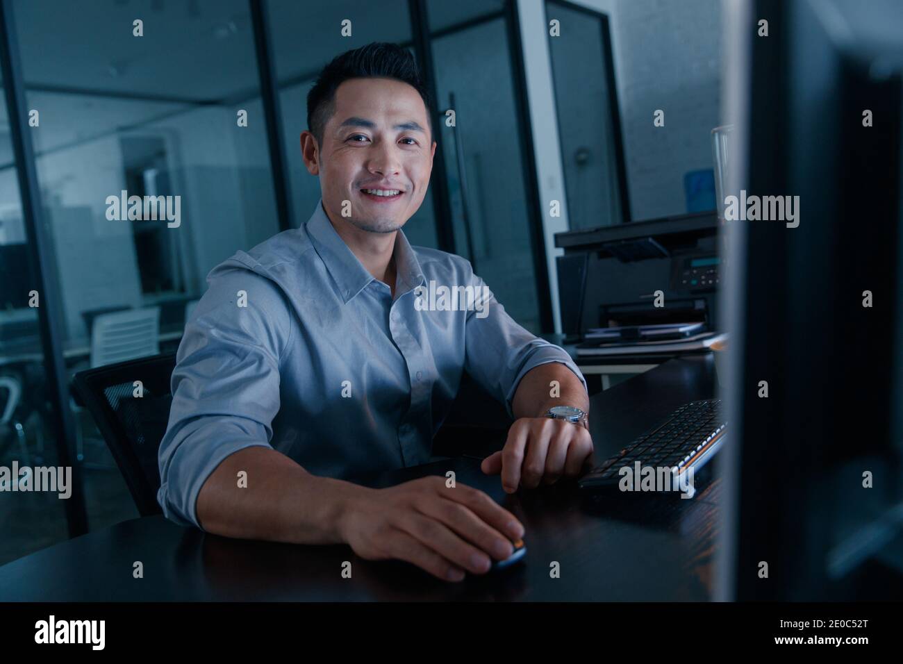 Business men in the office to work overtime Stock Photo - Alamy