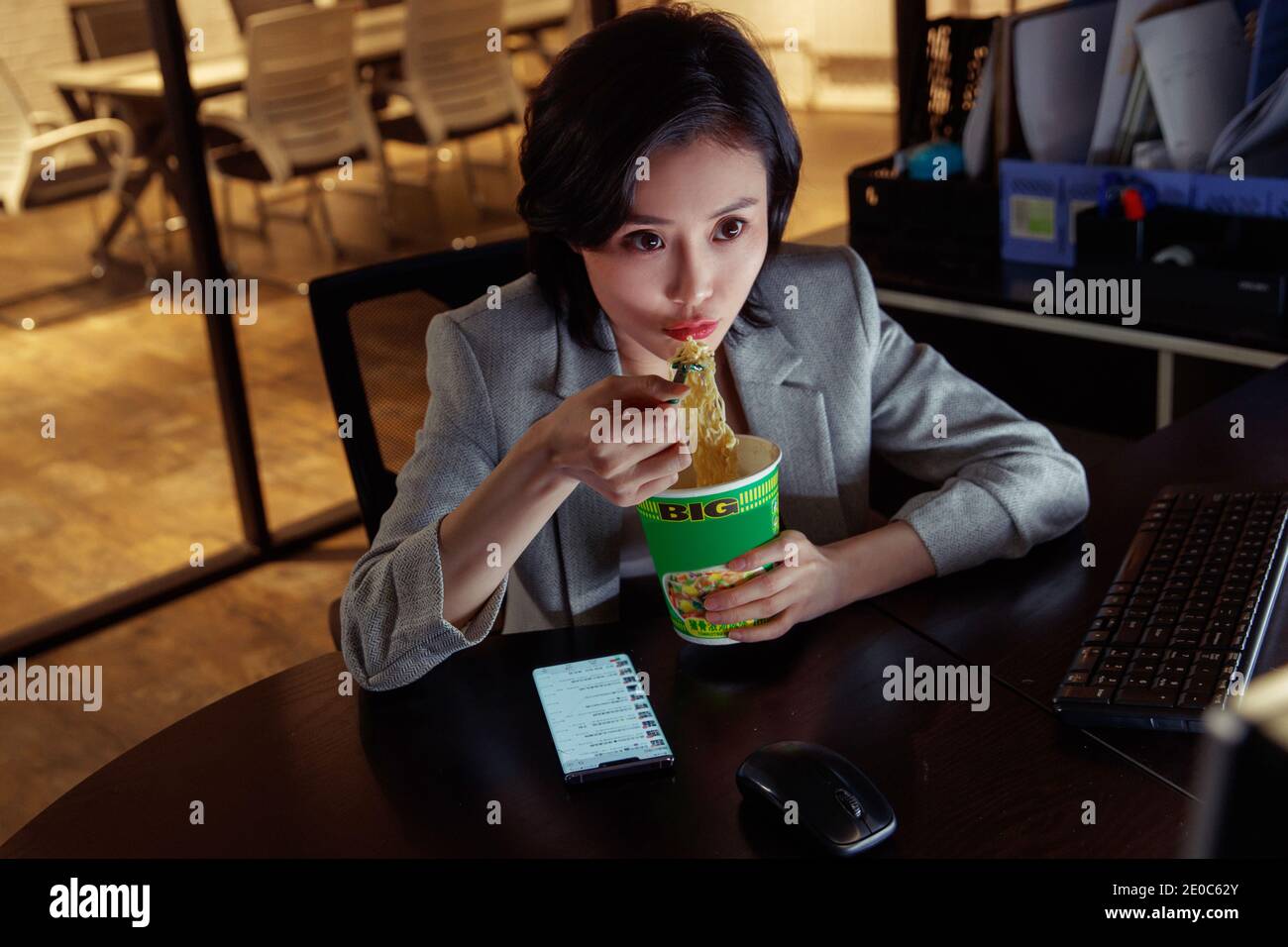 Instant noodles woman hi-res stock photography and images - Alamy