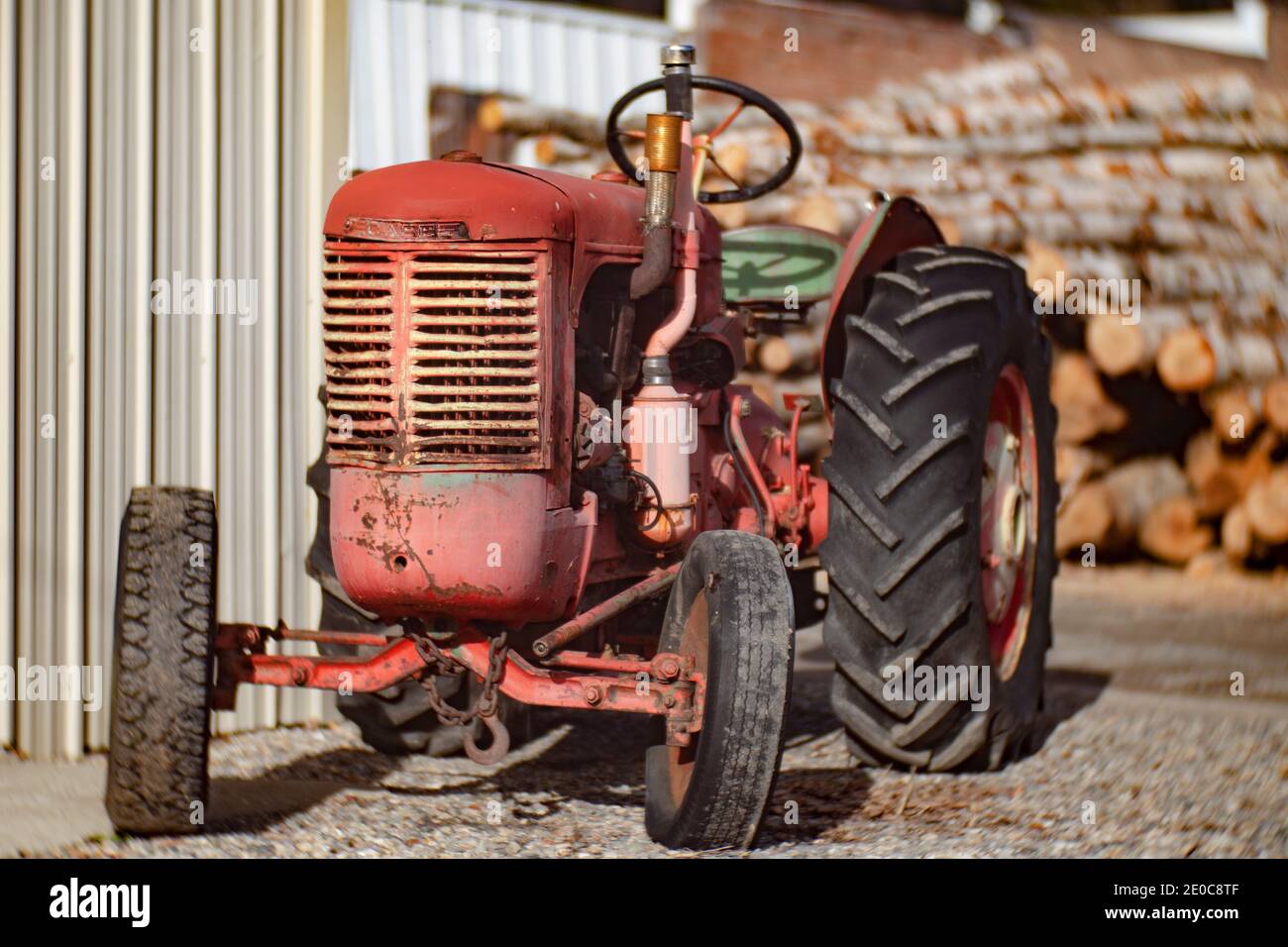 An old, red 1949 International Case Model S gas powered tractor, in an ...