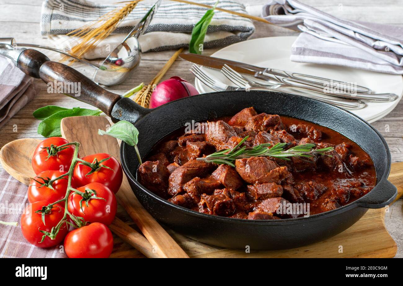Italian braised pork ragout with delicious red wine, rosemary, tomato ...