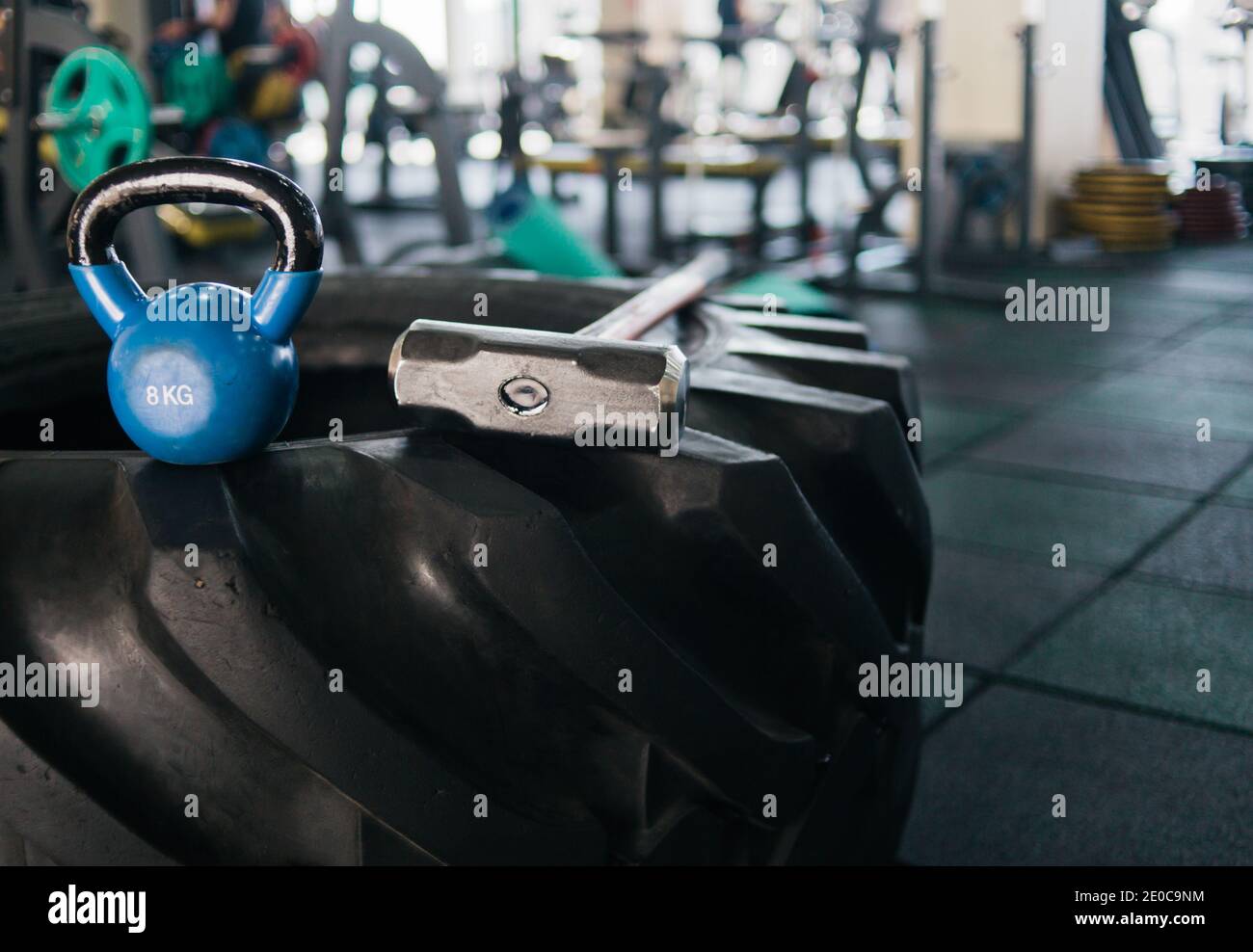 Equipment for functional training. Large rubber wheel, hammer ...