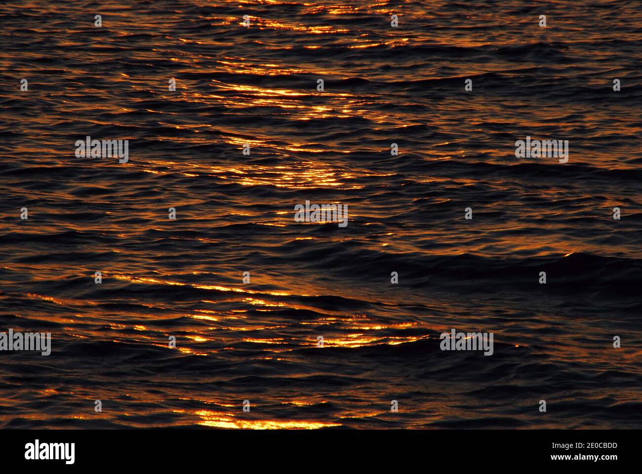 Sunlight reflects on ocean waves hi-res stock photography and images ...