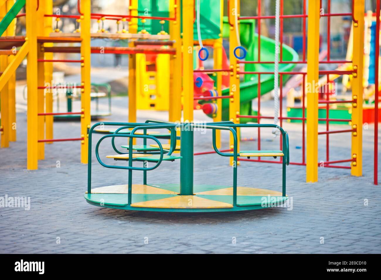 Circular rotational swing on the playground Stock Photo - Alamy