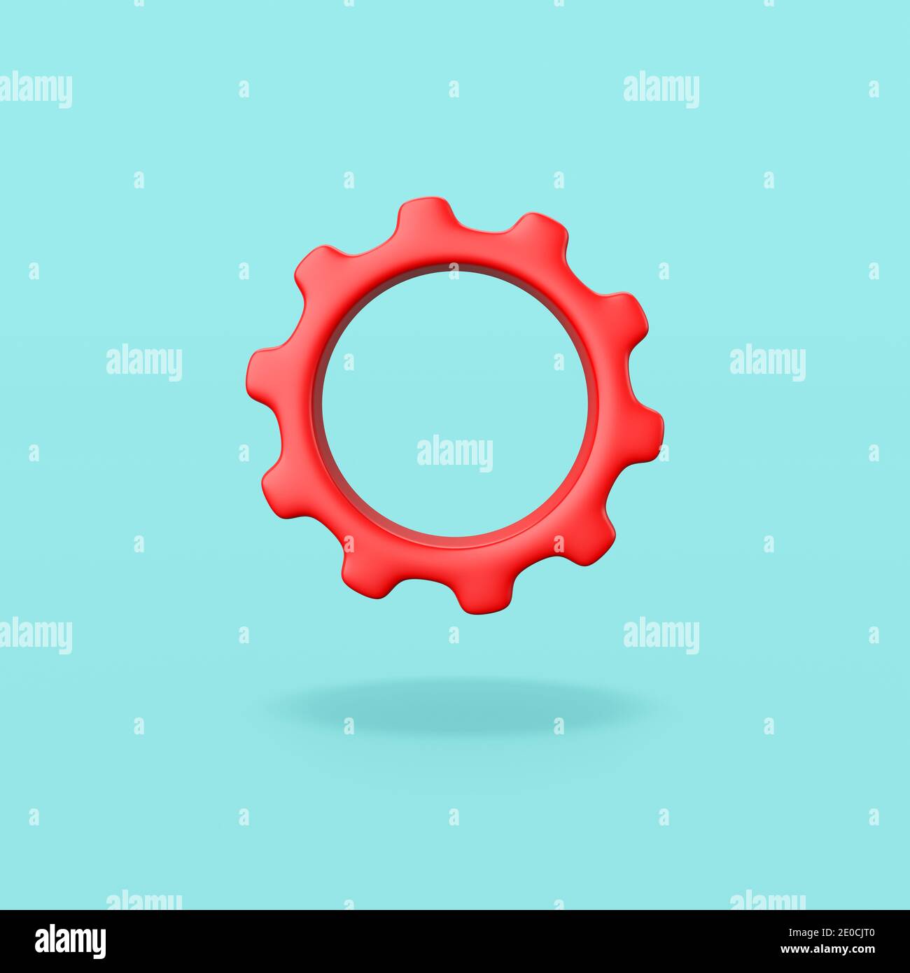 Red Gear on Light Blue Background Stock Photo - Alamy