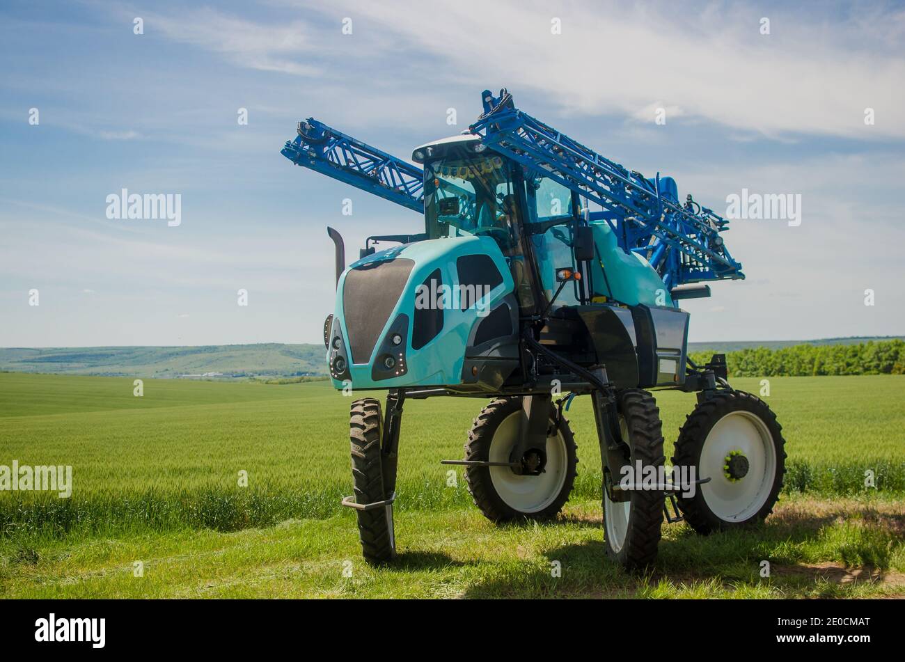Agricultural sprayers, spray chemicals on young wheat. spraying ...