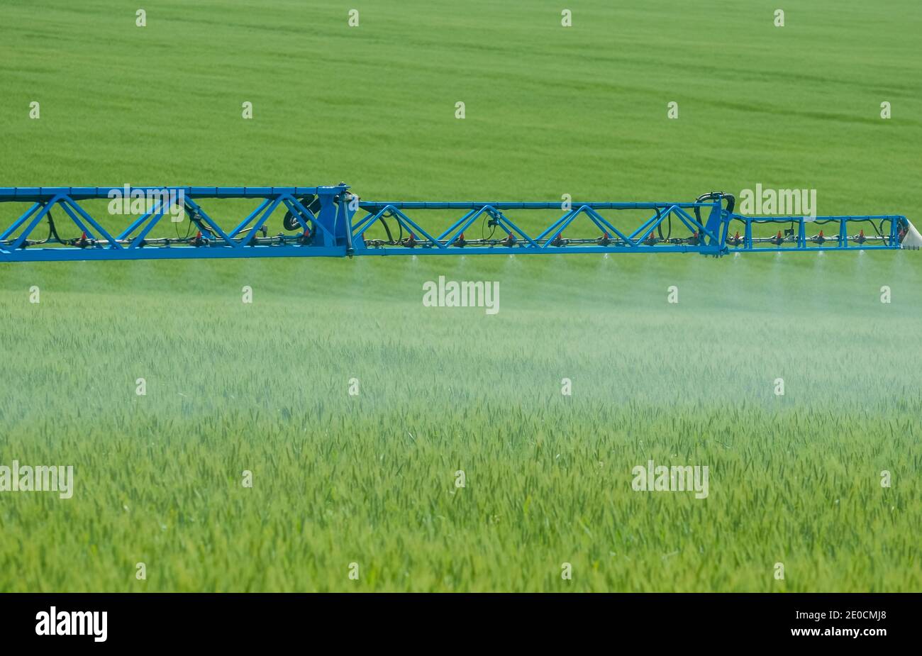 Agricultural sprayers, spray chemicals on young wheat. spraying ...