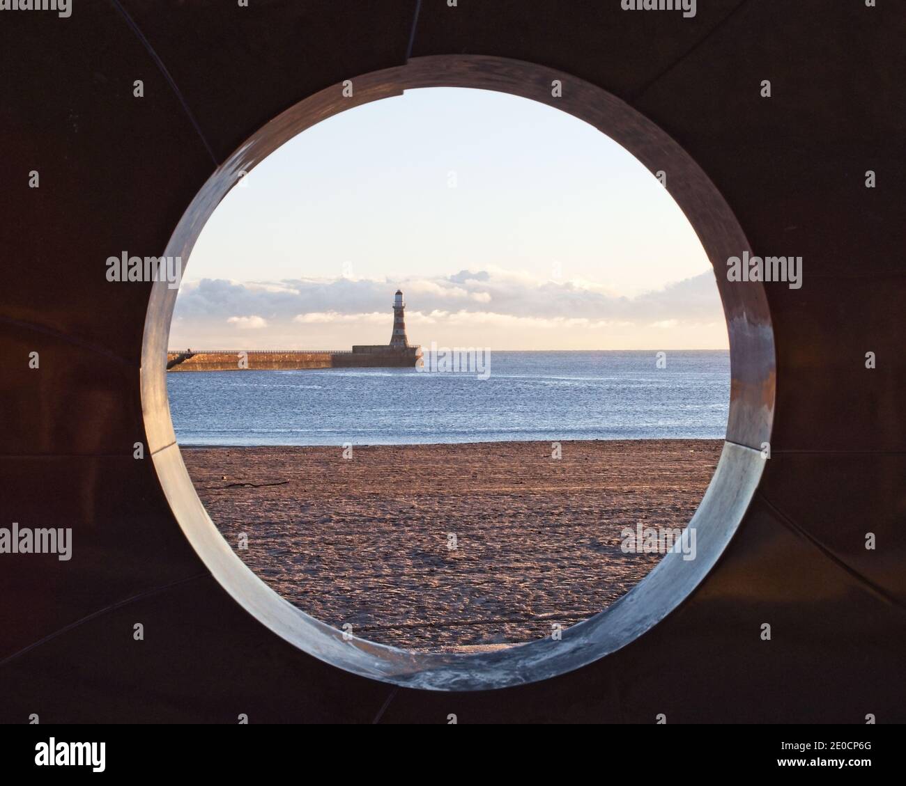 Roker Pier and Lighthouse captured through the opening of a modern ...