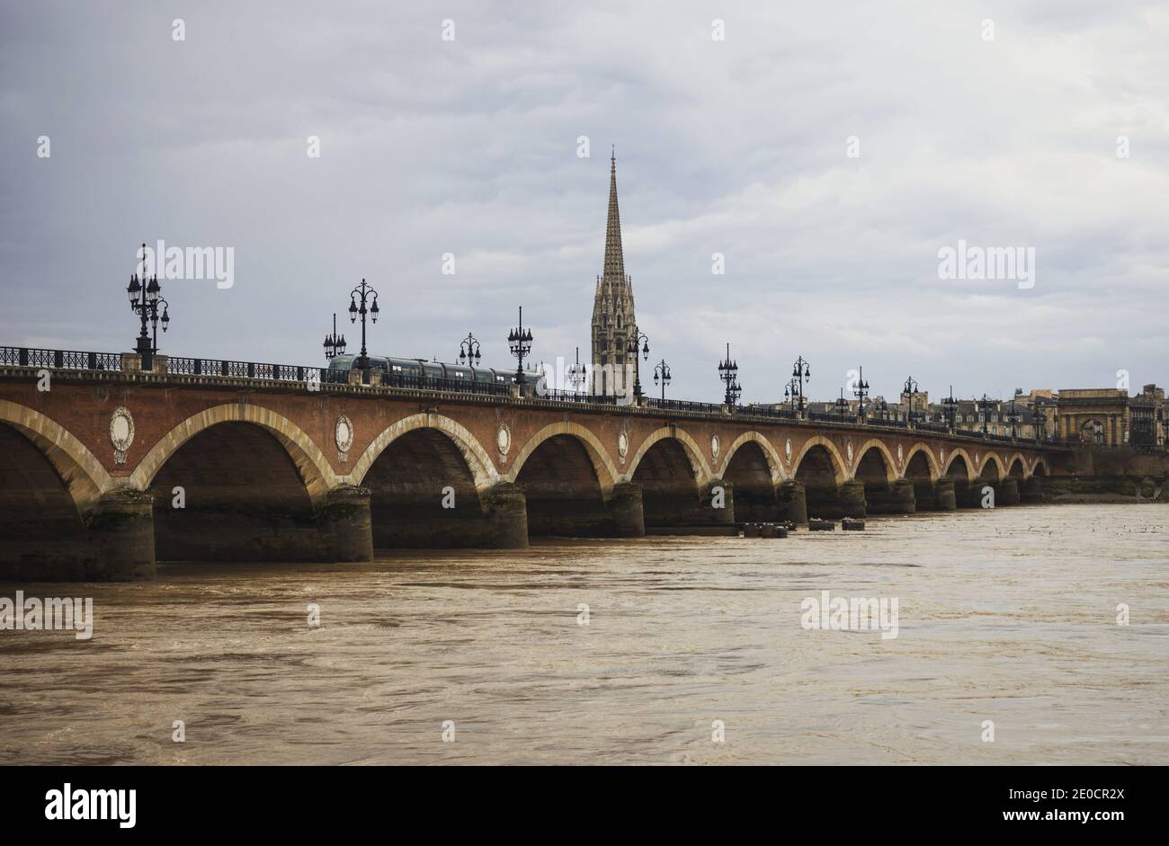 Pont de pierre Saint stone bridge with arches over Garonne river in ...