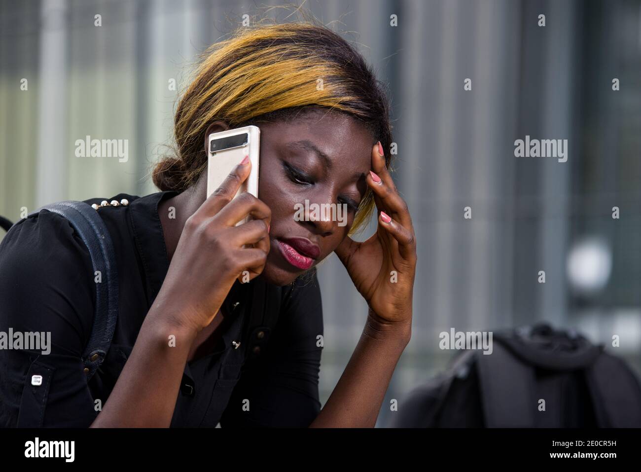 Displeased woman speaks on hi-res stock photography and images - Alamy