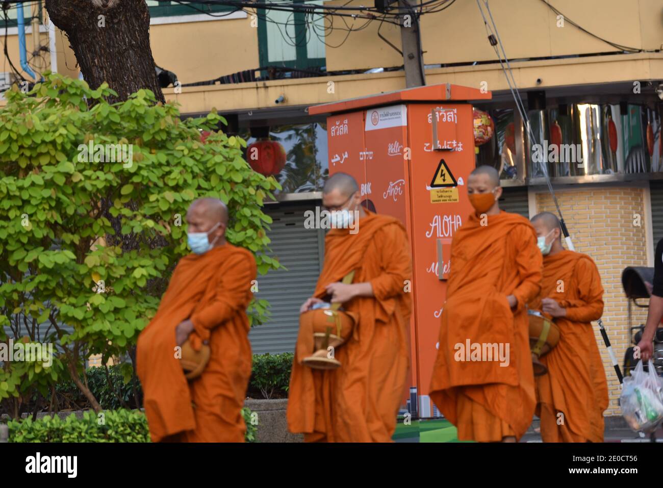 Bangkok, Thailand. 31st Dec, 2020. Bangkok : Monks leaving the temple ...