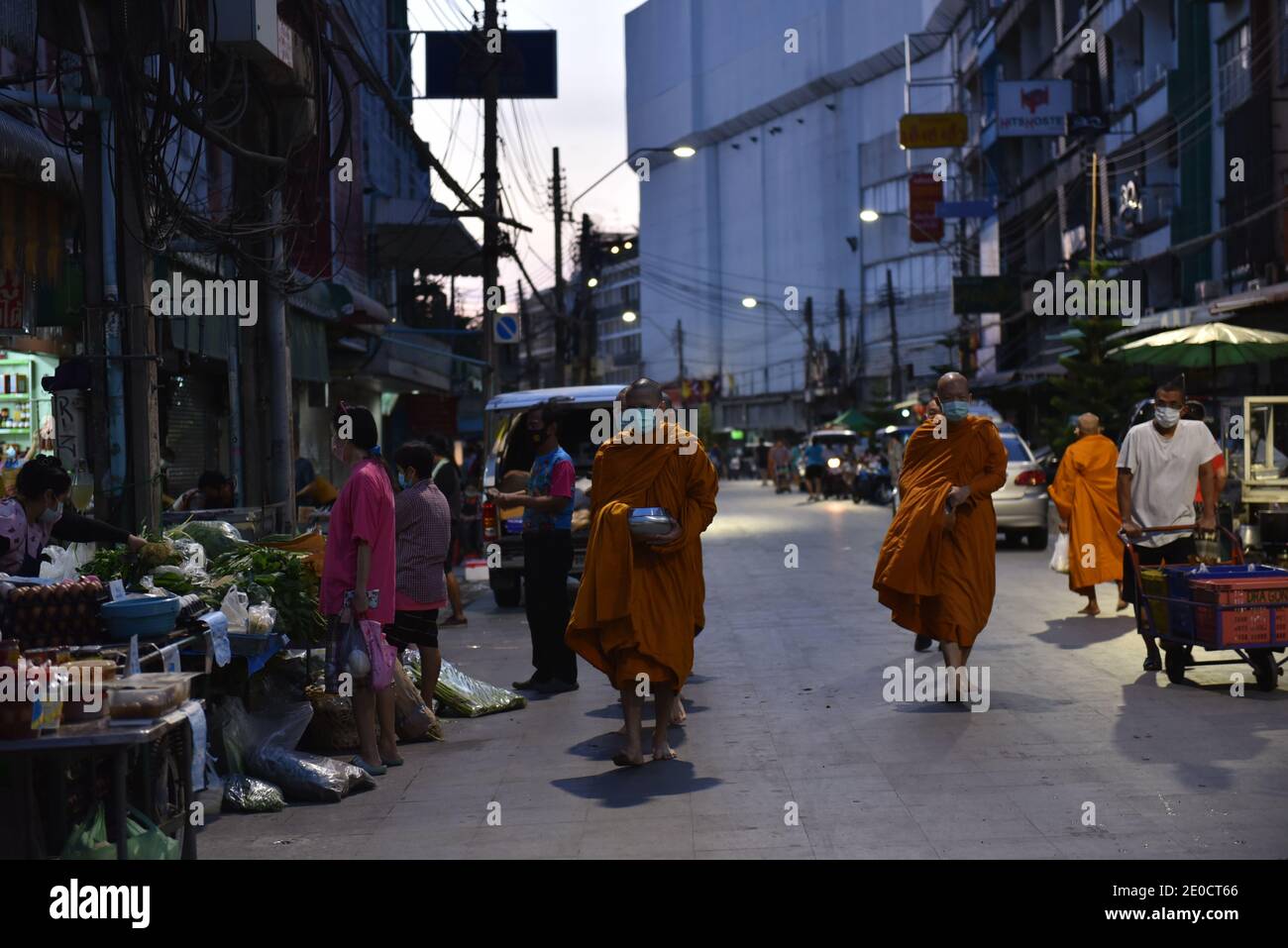 Bangkok, Thailand. 31st Dec, 2020. Bangkok : Monks leaving the temple ...