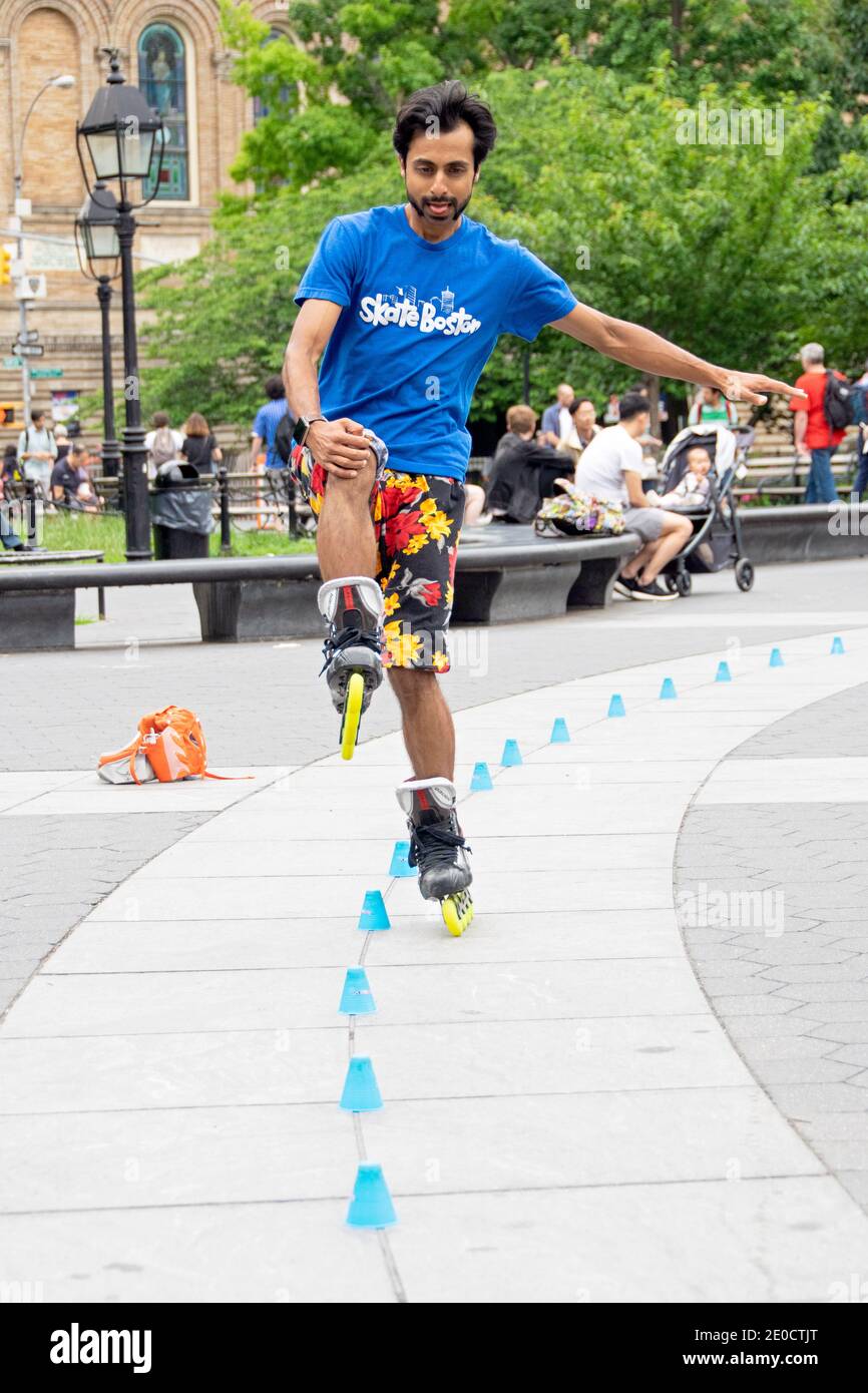 Photo of a skillful inline skater practicing in Washington Square Park ...