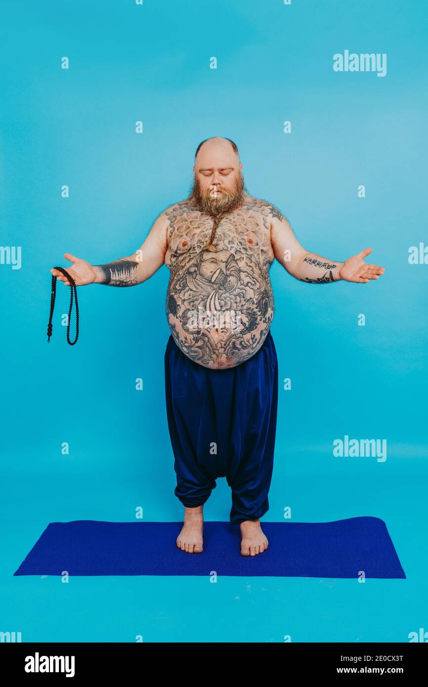 Funny fat man doing yoga meditation, funny and ironic character Stock ...