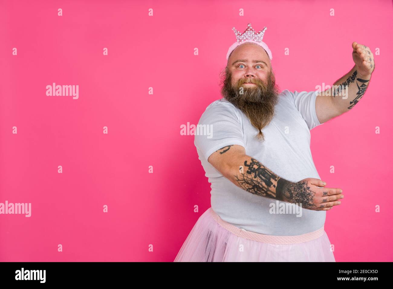Fat man playing with belly hi-res stock photography and images - Alamy