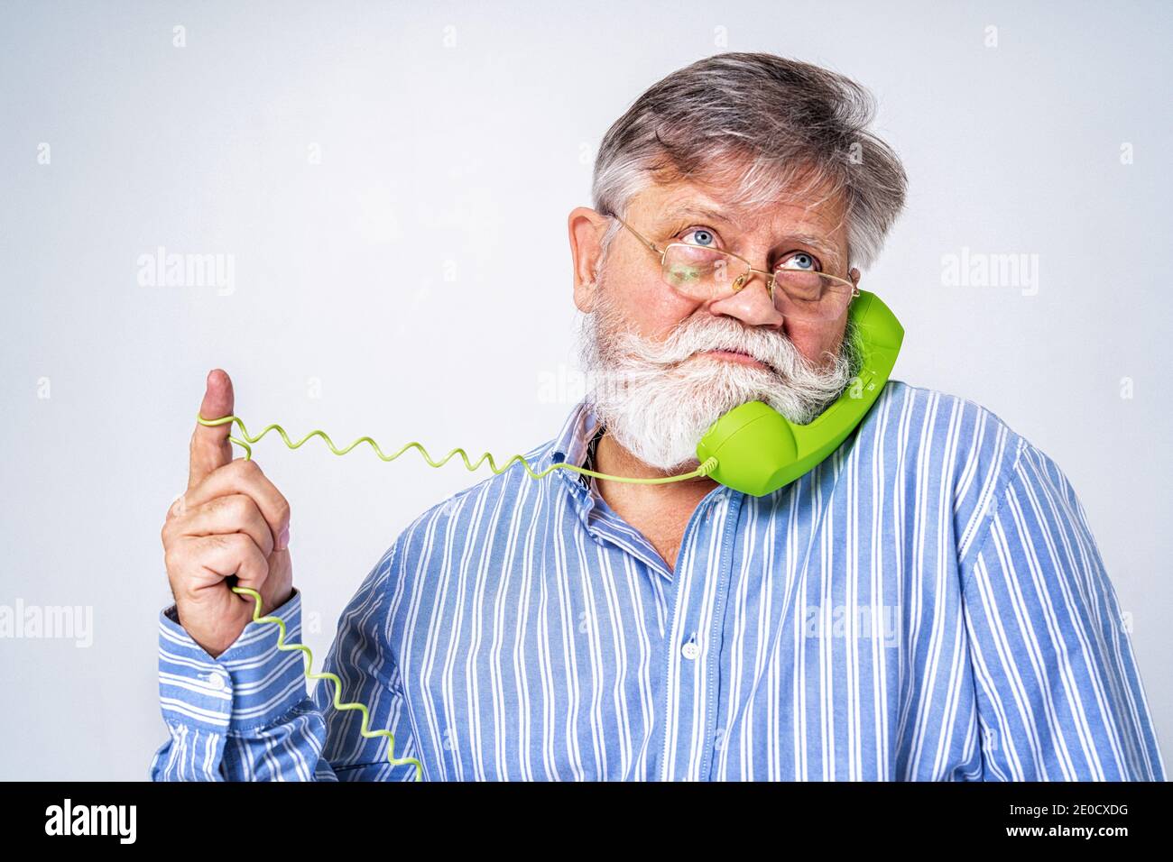 Eccentric senior man with funny expression portrait on background ...